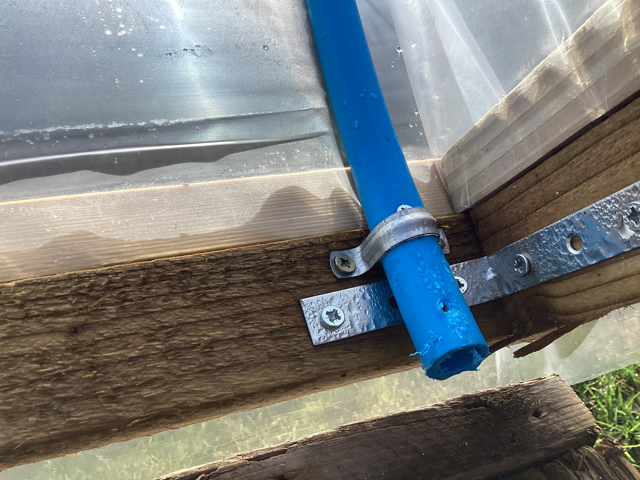 How To Build a Hoop House With PVC Pipe In 4 Easy Steps - Micro Farm Days